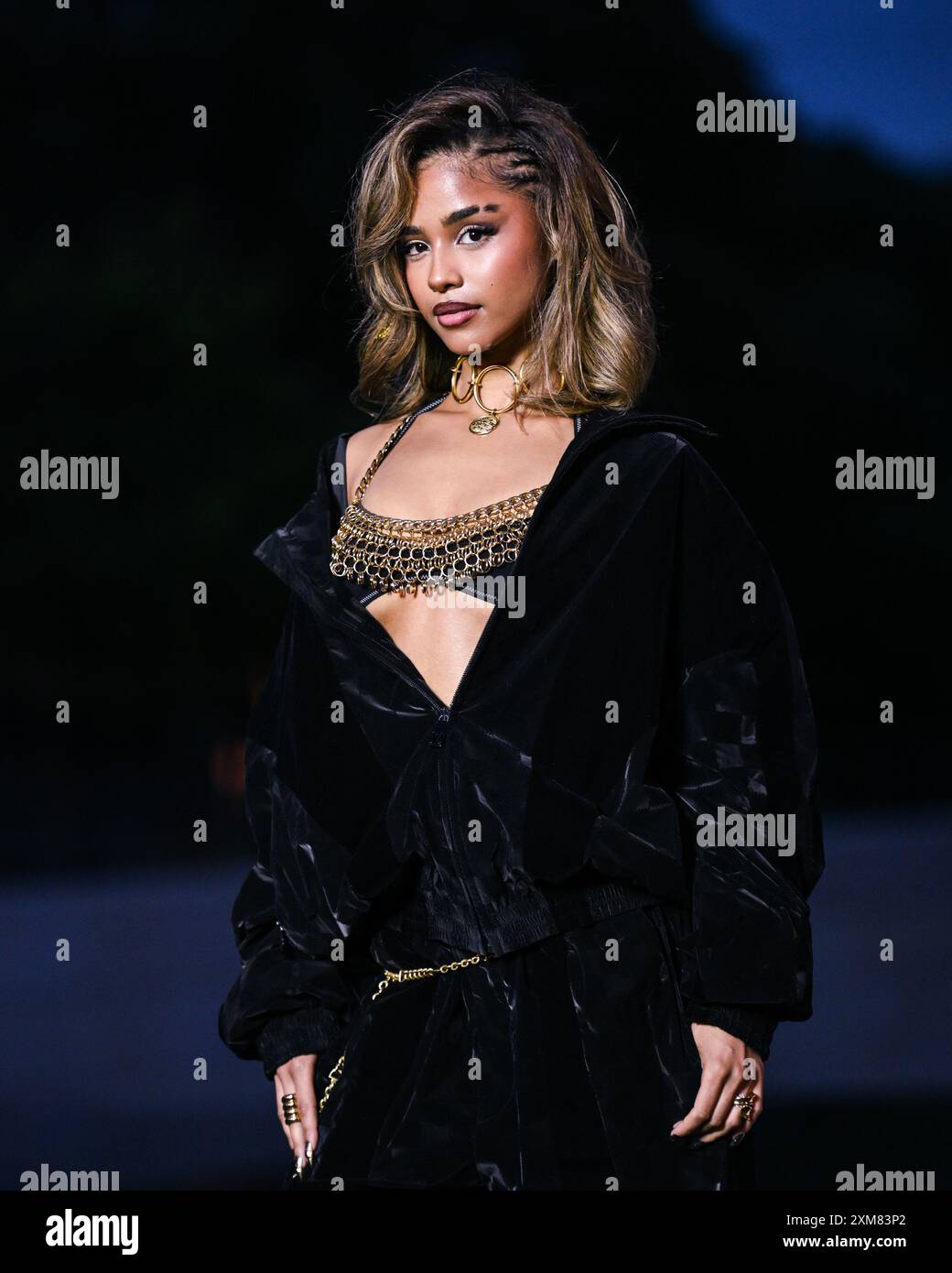 Tyla posing for photos on the red carpet at The Prelude to the Olympics ...