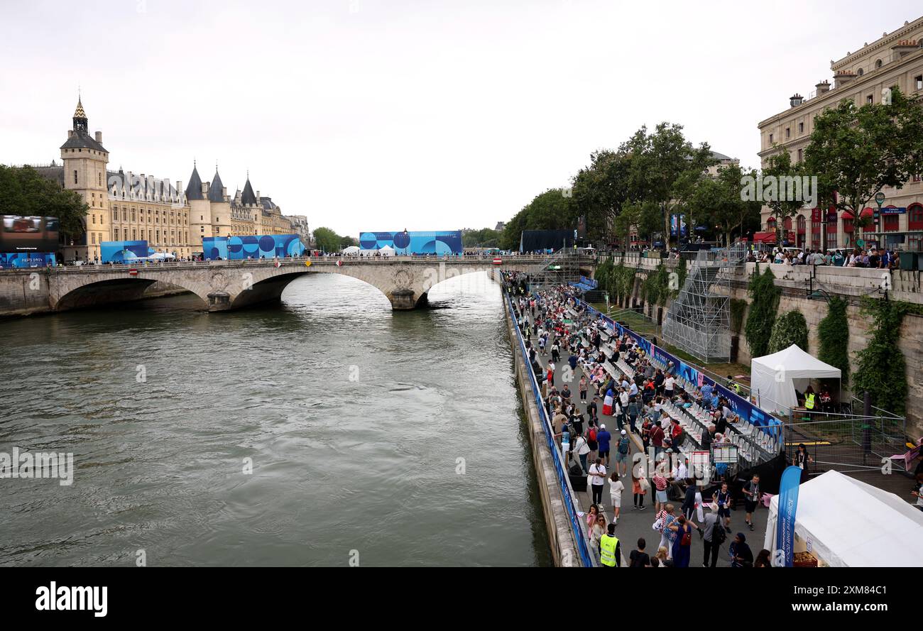 Paris, France. July 26th 2024. Spectators begin to take their places along the River Seine ...