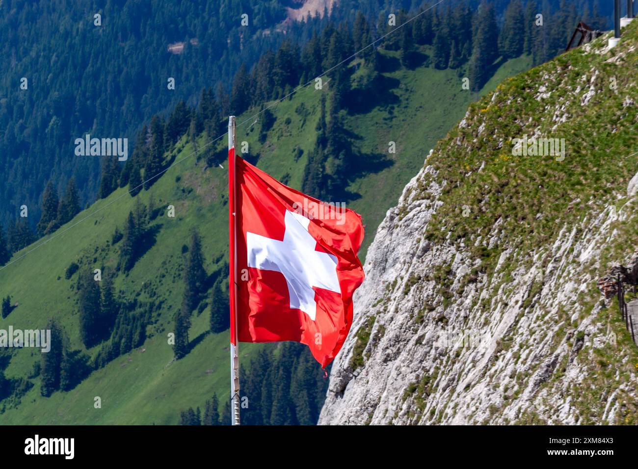 Swiss flag in the Swiss Alps, near Lucerne on Mount Pilatus Stock Photo ...