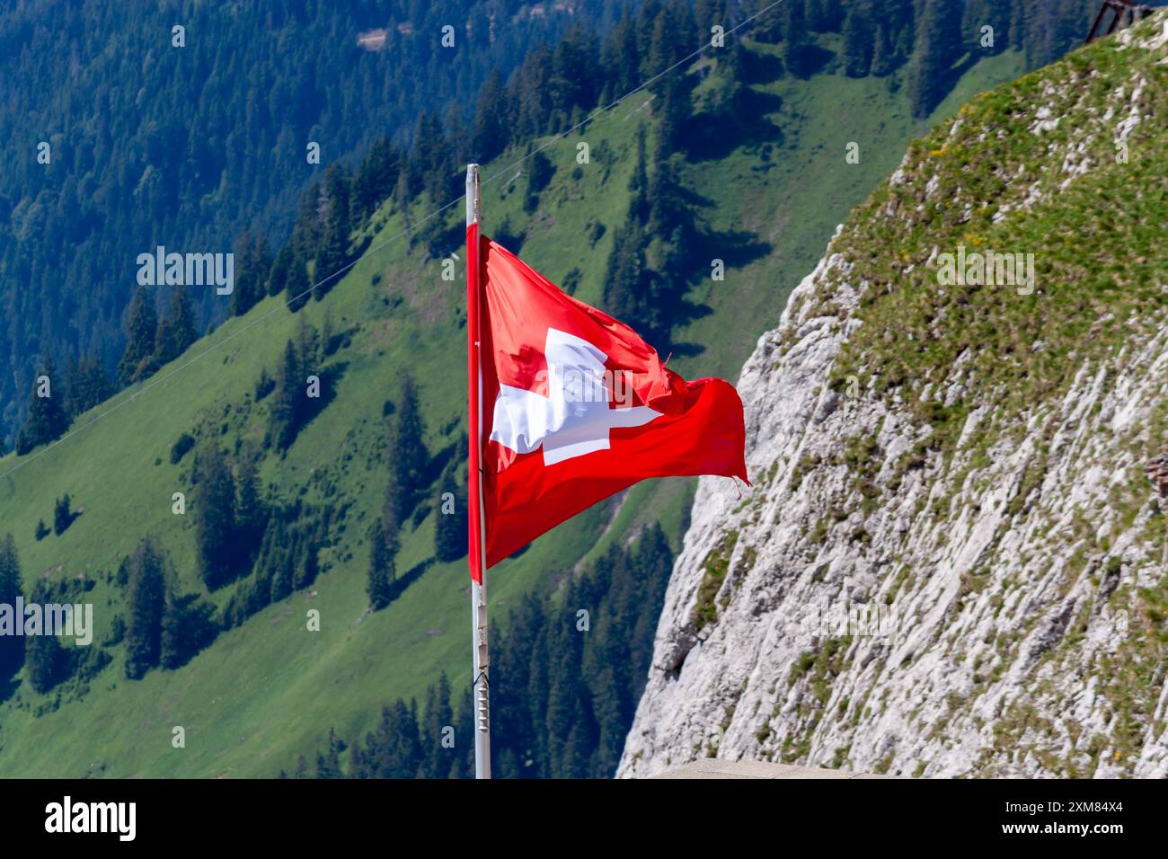 Swiss flag in the Swiss Alps, near Lucerne on Mount Pilatus Stock Photo ...