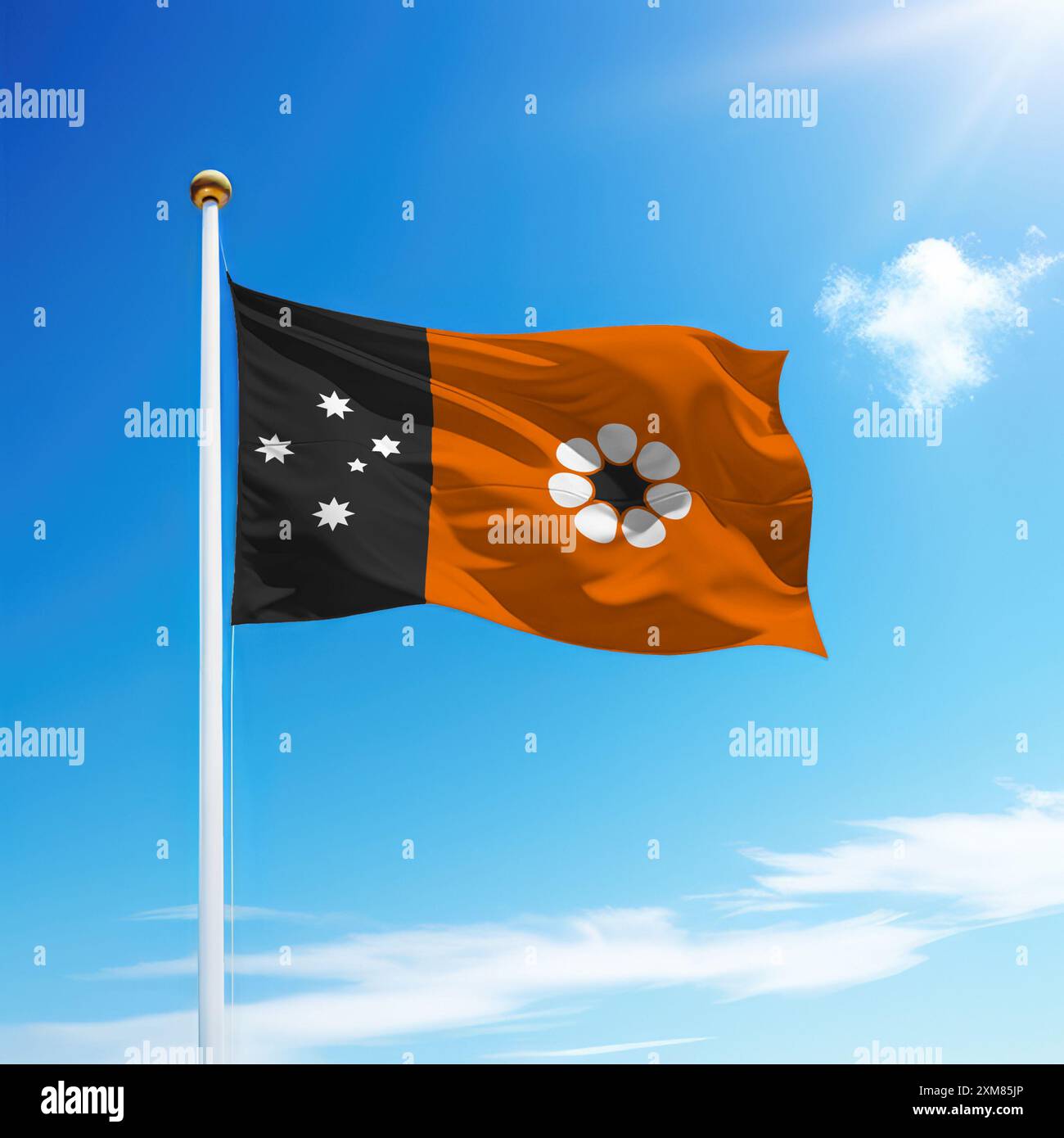 Waving flag of Northern Territory is a state of Australia on flagpole ...