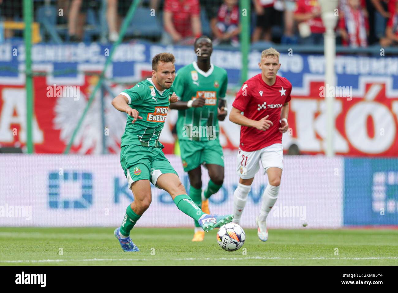 Matthias Seidl of Rapid Wien (L) and Patryk Gogol of Wisl Krakow (R ...
