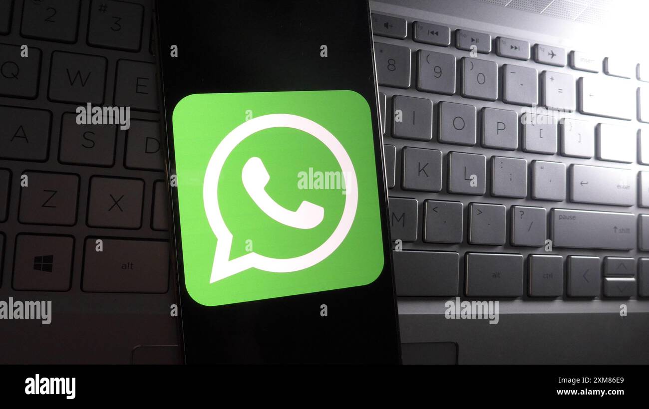 In this photo illustration, WhatsApp logo is displayed on a smartphone ...