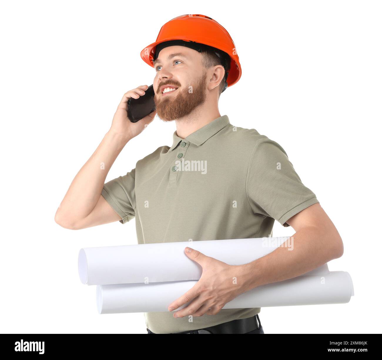 Engineer in hard hat with drafts talking on smartphone against white ...