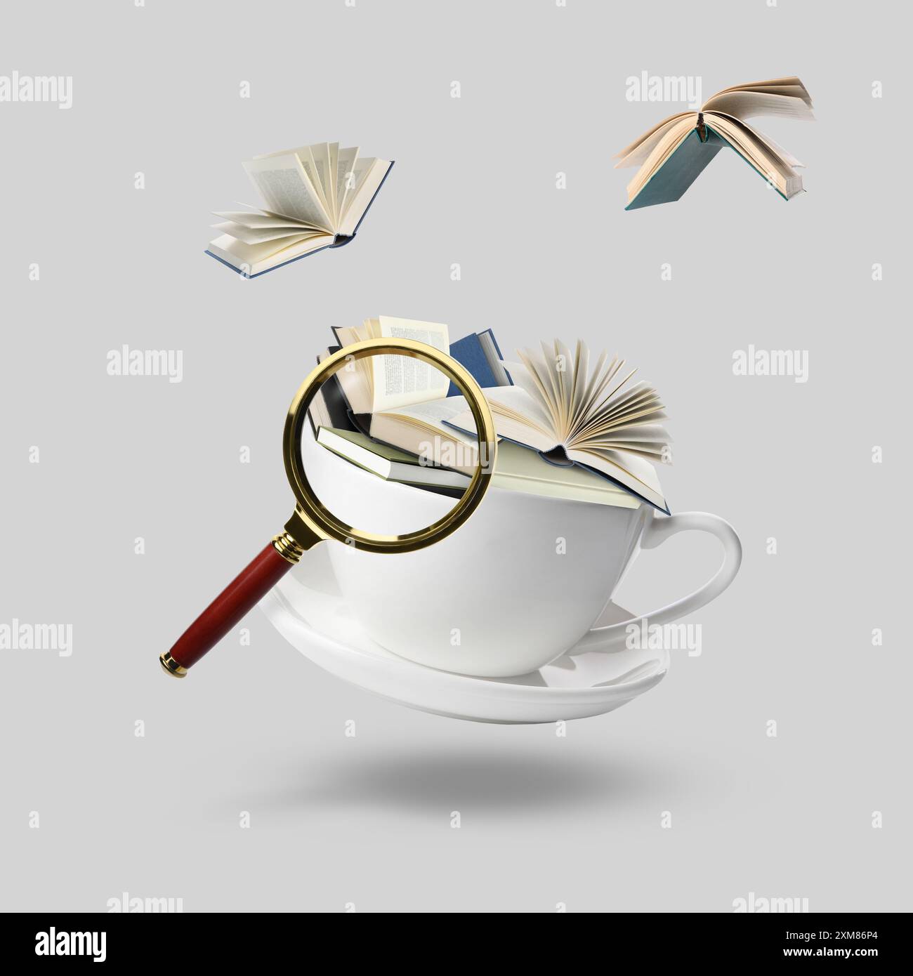 Coffee cup with books and magnifying glass in air on grey background ...