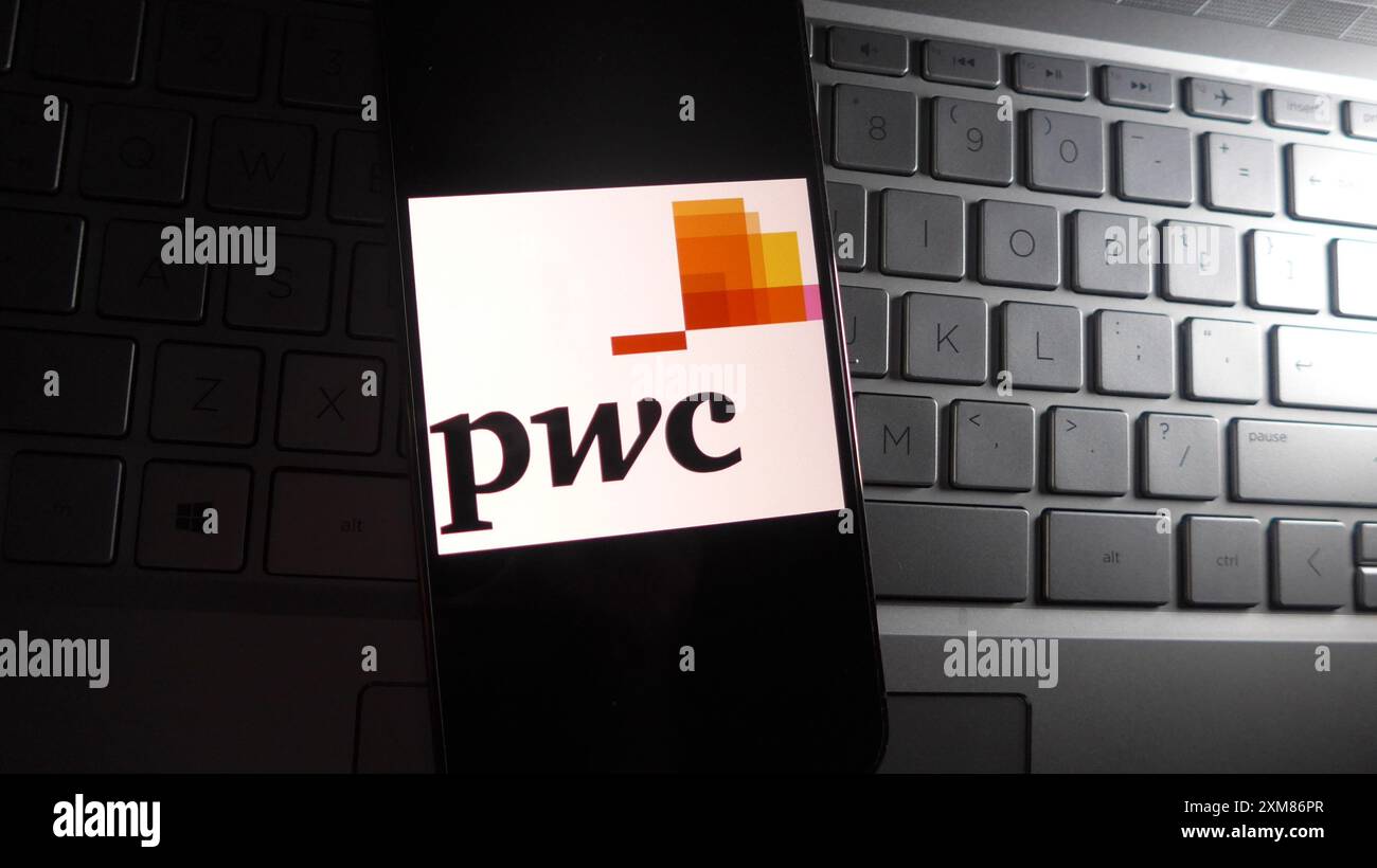 In this photo illustration, PwC logo is displayed on a smartphone with ...