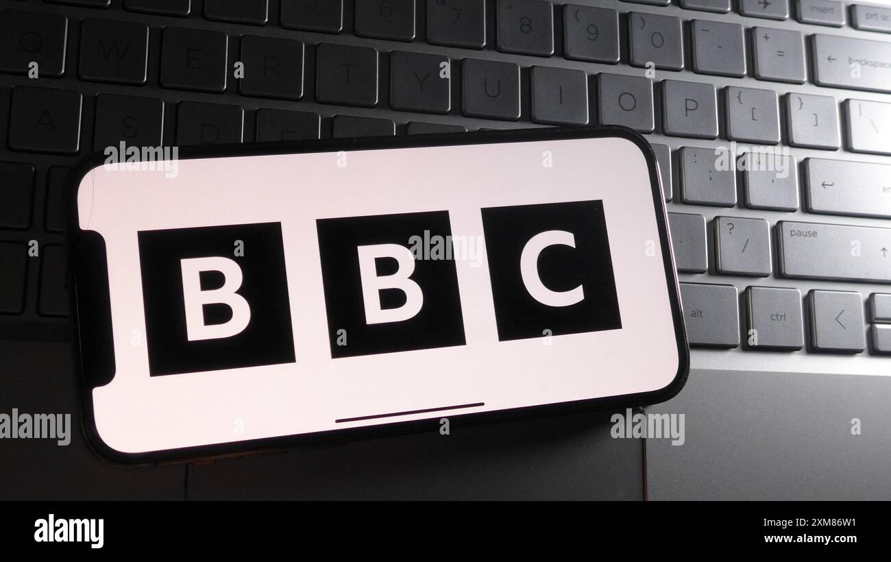 In this photo illustration, BBC logo is displayed on a smartphone with ...