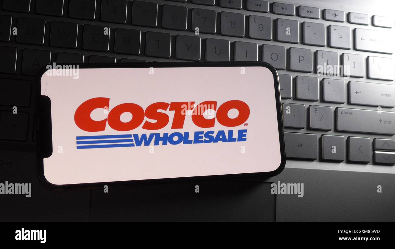 In this photo illustration, Costco logo is displayed on a smartphone ...