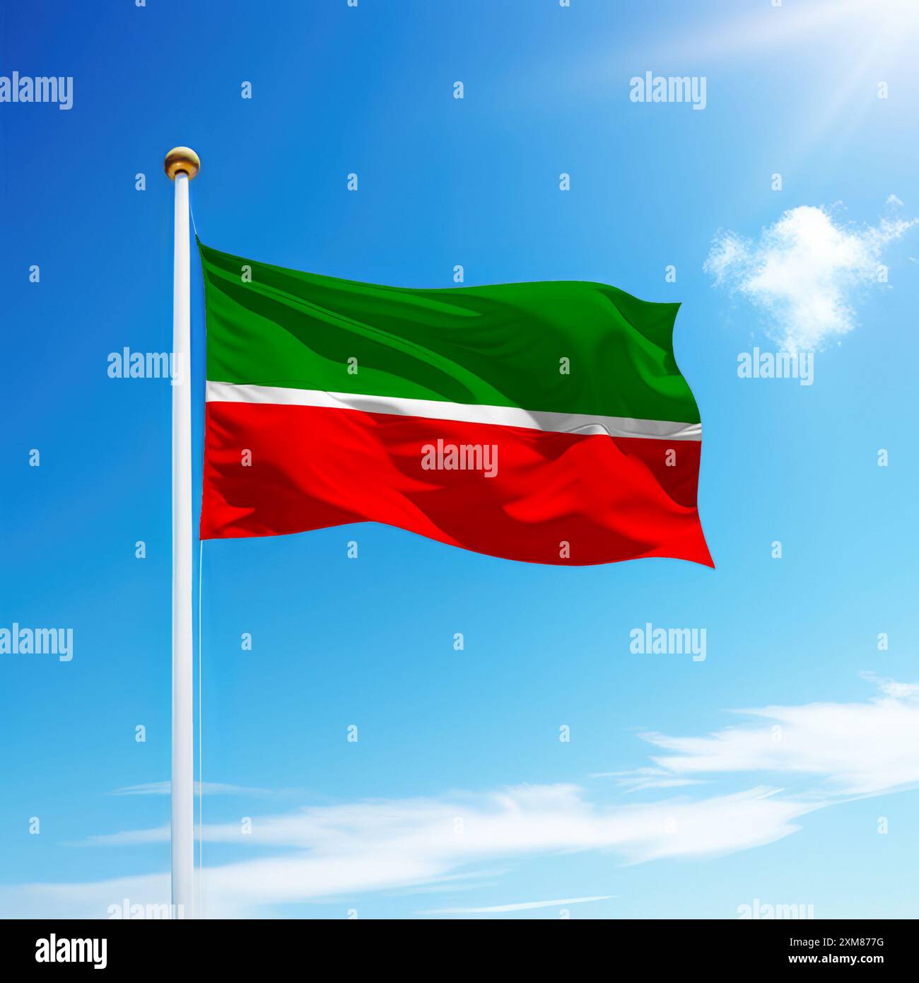 Waving flag of Tatarstan is a region of Russia on flagpole with sky ...