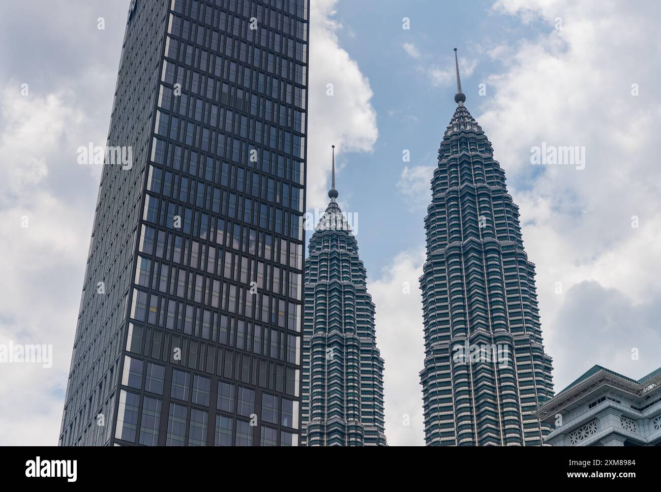 A picture of the Petronas Twin Towers as seen through other nearby ...