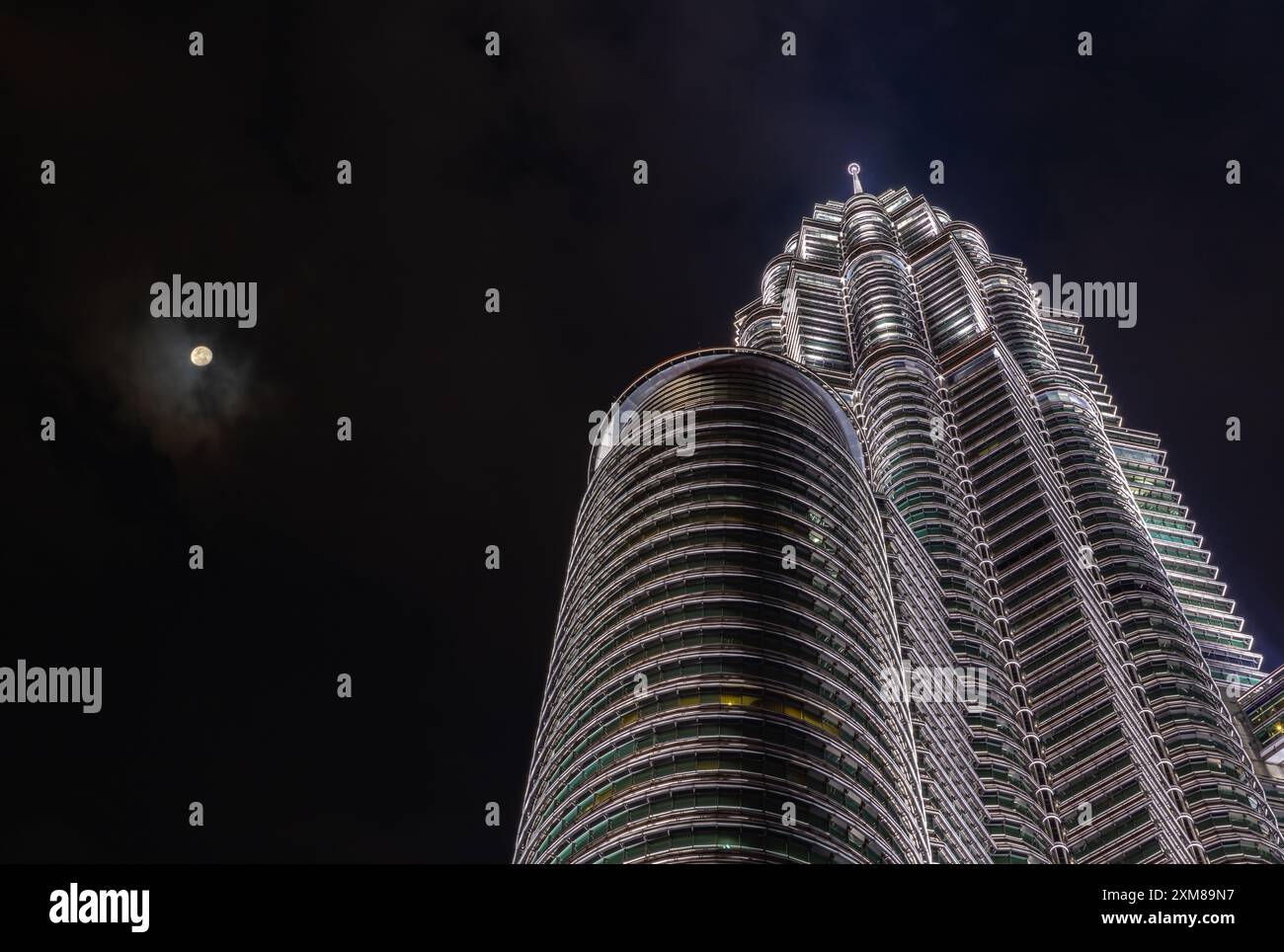 A picture of the Petronas Twin Towers as seen from below at night Stock ...