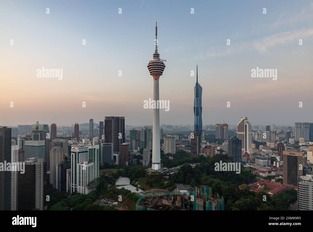 A picture of the Menara Kuala Lumpur and Merdeka 118 Towers at dawn ...
