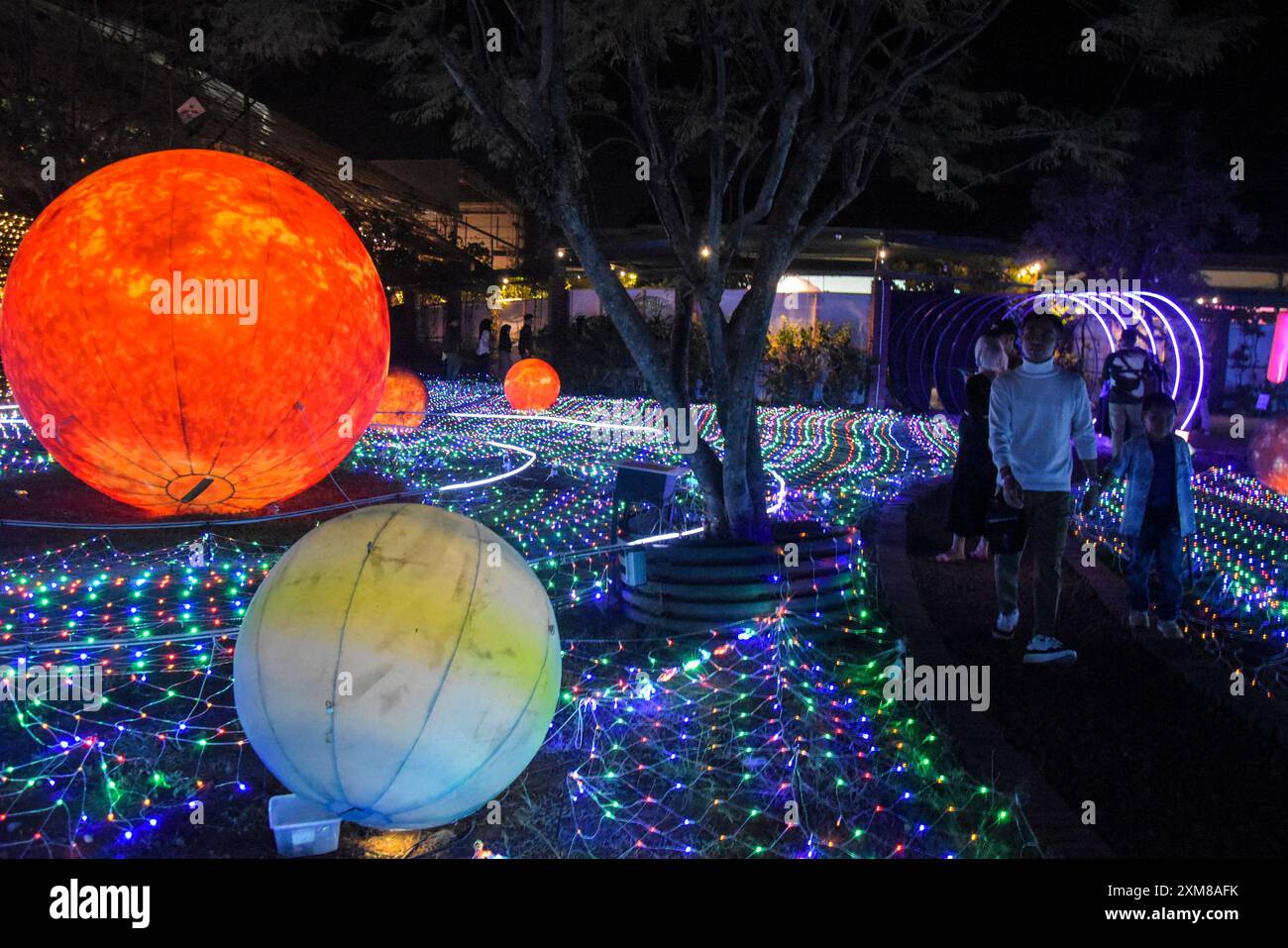 Bandung, Indonesia. 26th July, 2024. People visit the Galactic Glow ...