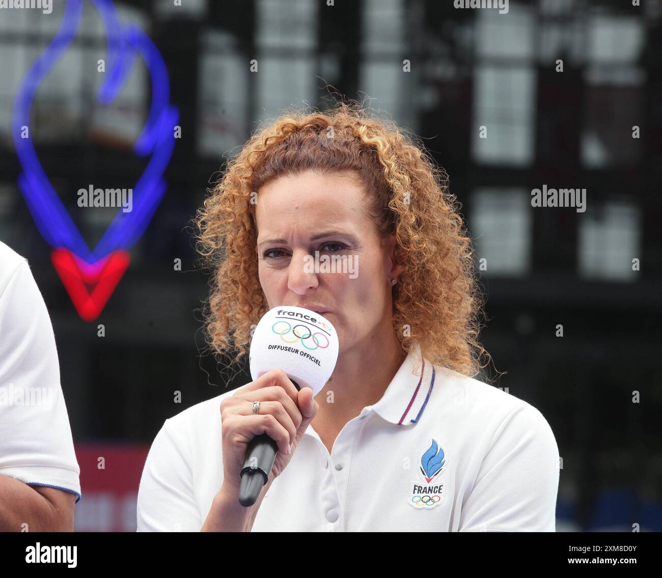 Melina Robert-Michon (FRANCE) for the Olympic torch relay at Club ...