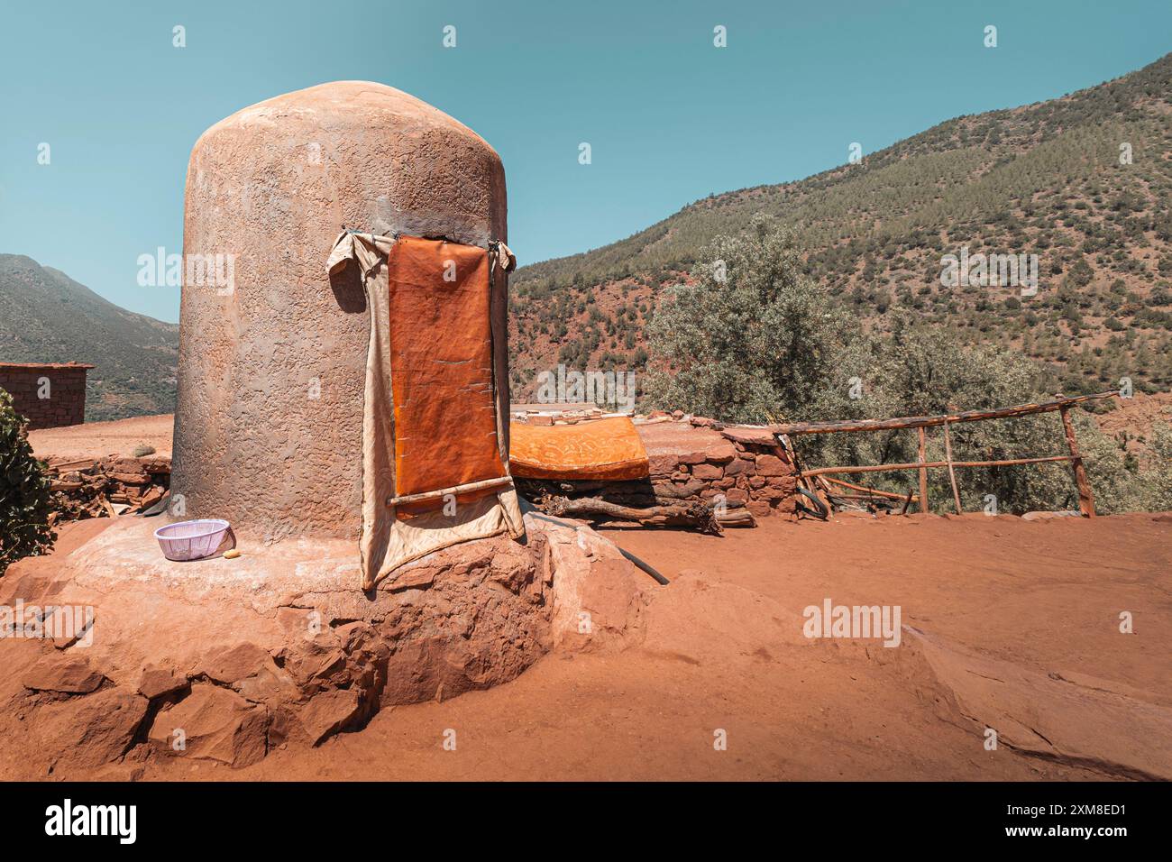 A traditional stone structure with a rounded top, situated in a rural ...