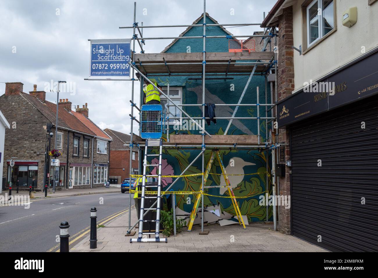 Mural, street art being painted on the side of The Bristol Spice ...