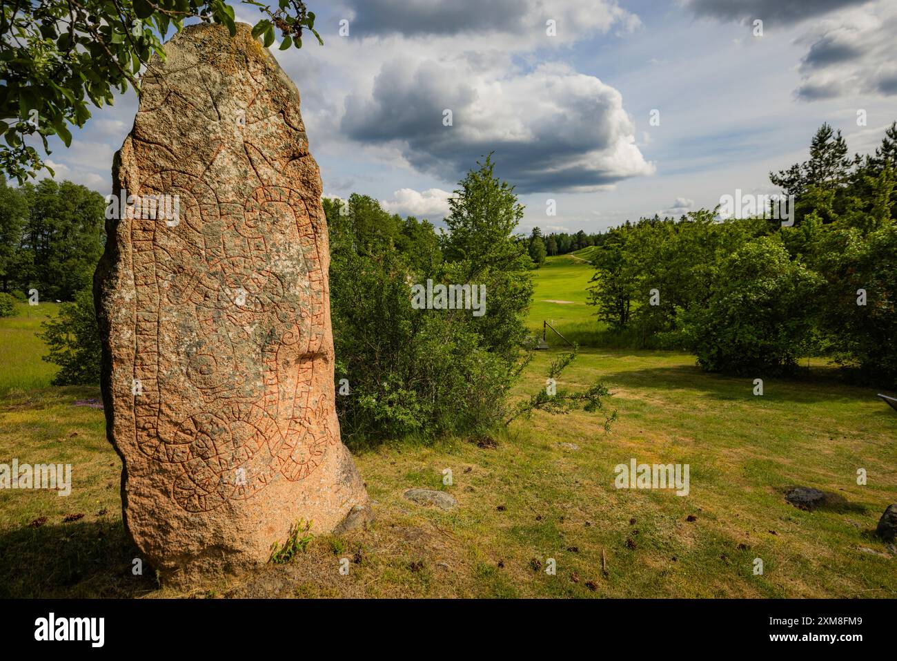 Ancient Viking runestone in the counryside of centrsl Sweden Stock ...