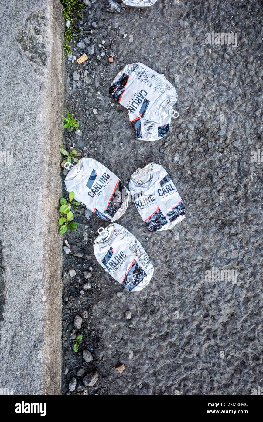 Crumpled squashed Carling Black Label beer cans on ground Stock Photo ...