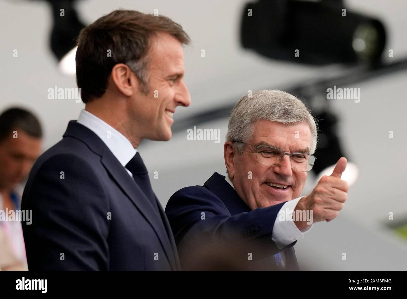France President Emmanuel Macron and IOC President Thomas Bach arrive ...