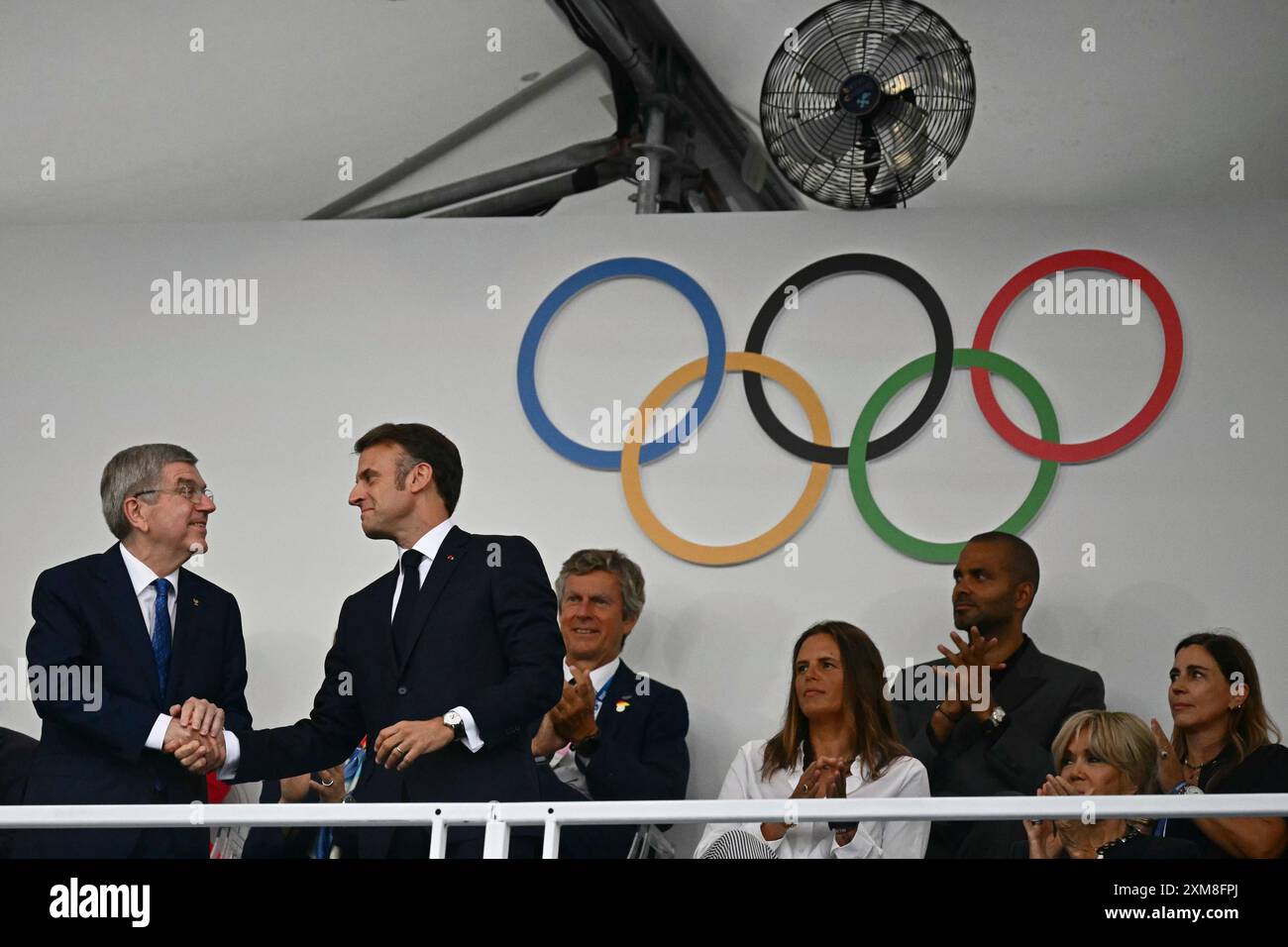 France's President Emmanuel Macron, second from left, and IOC President ...
