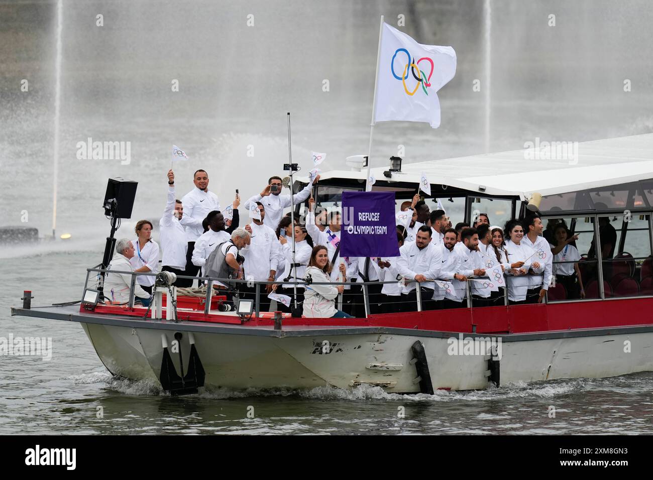 Olympic Refugee Team moves along the Seine River in Paris, France ...