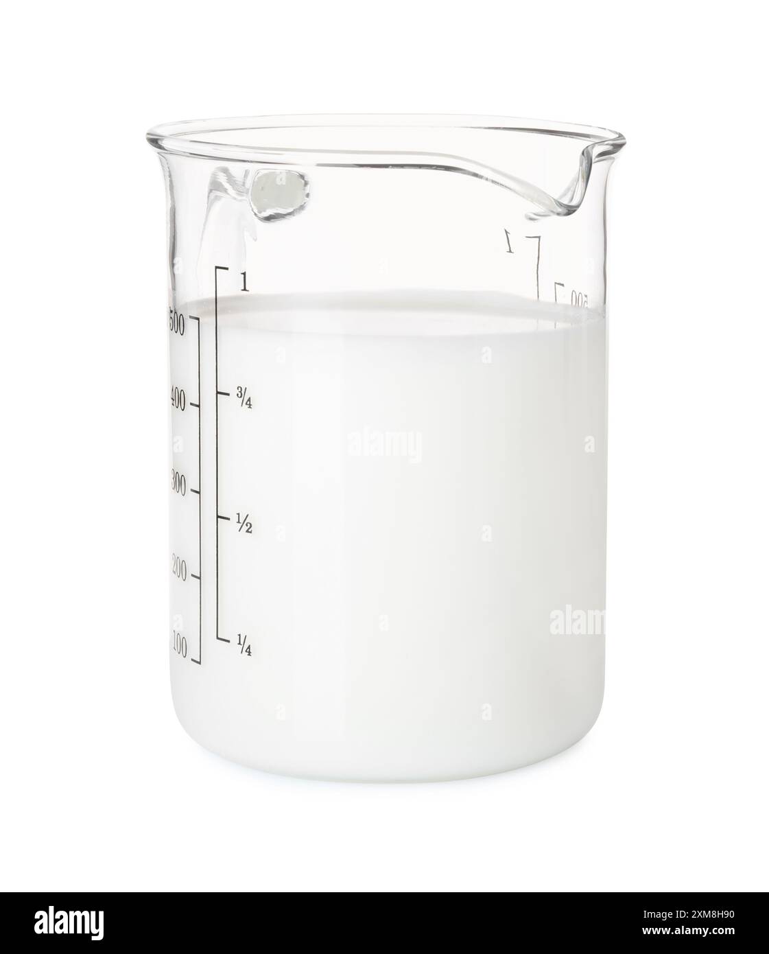 Fresh milk in measuring cup isolated on white Stock Photo - Alamy