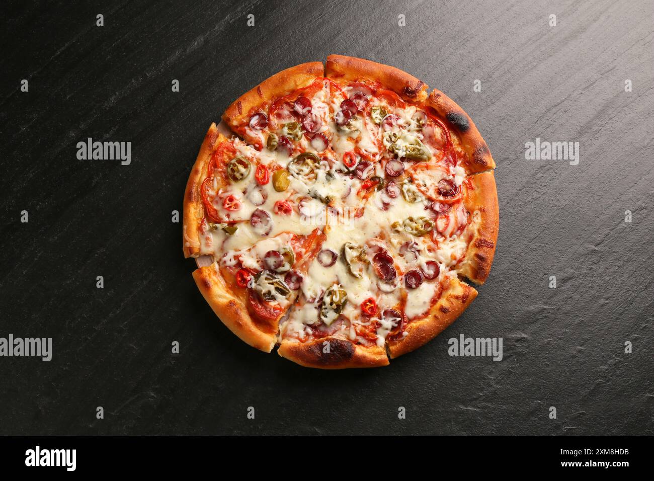 Delicious pizza Diablo on dark textured table, top view Stock Photo - Alamy