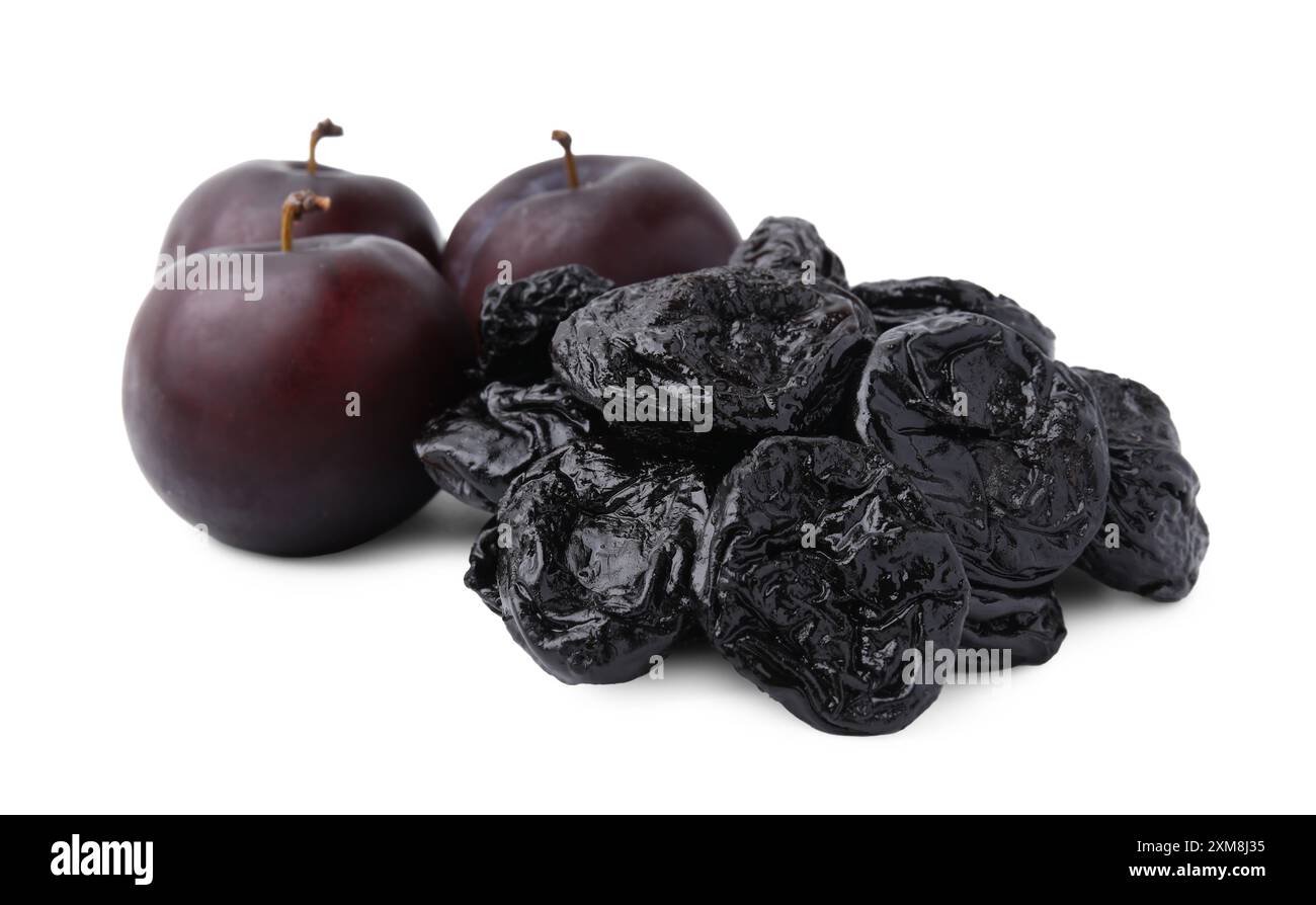 Delicious prunes and fresh ripe plums isolated on white Stock Photo - Alamy