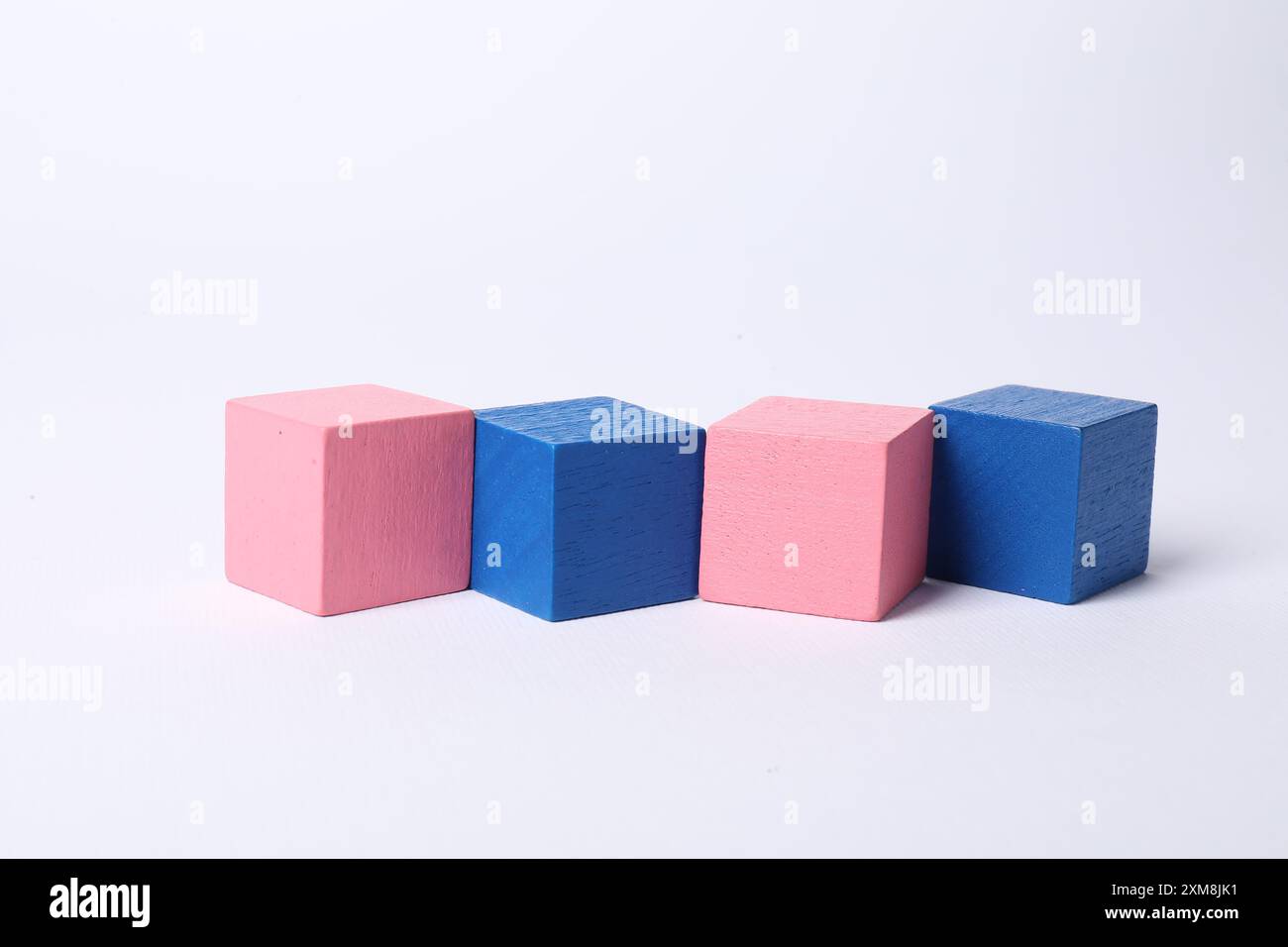 Many blank pink cubes hi-res stock photography and images - Alamy