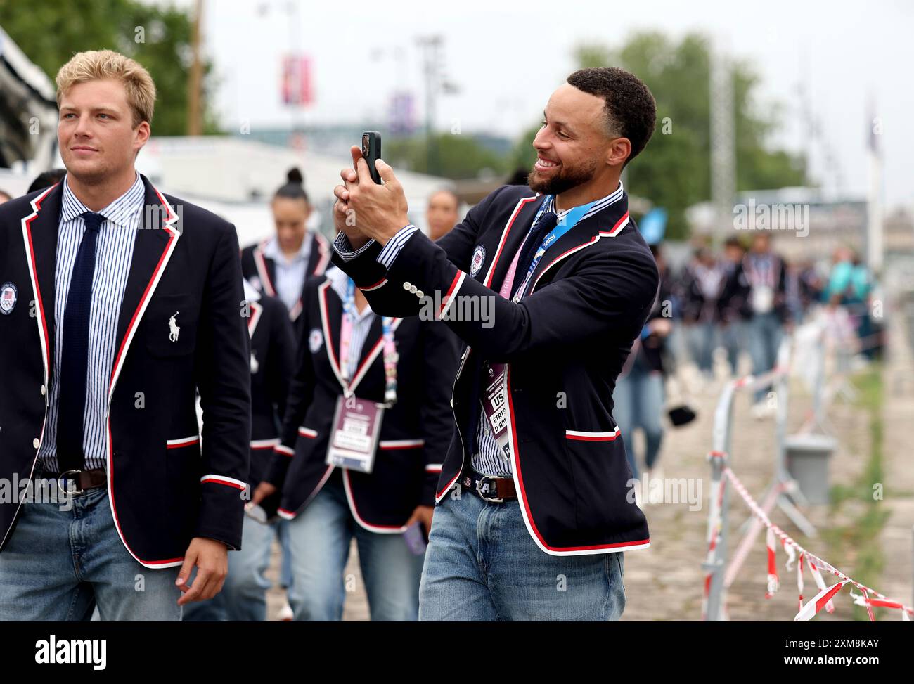 Stephen Curry of the United States takes a photo prior to the opening ...