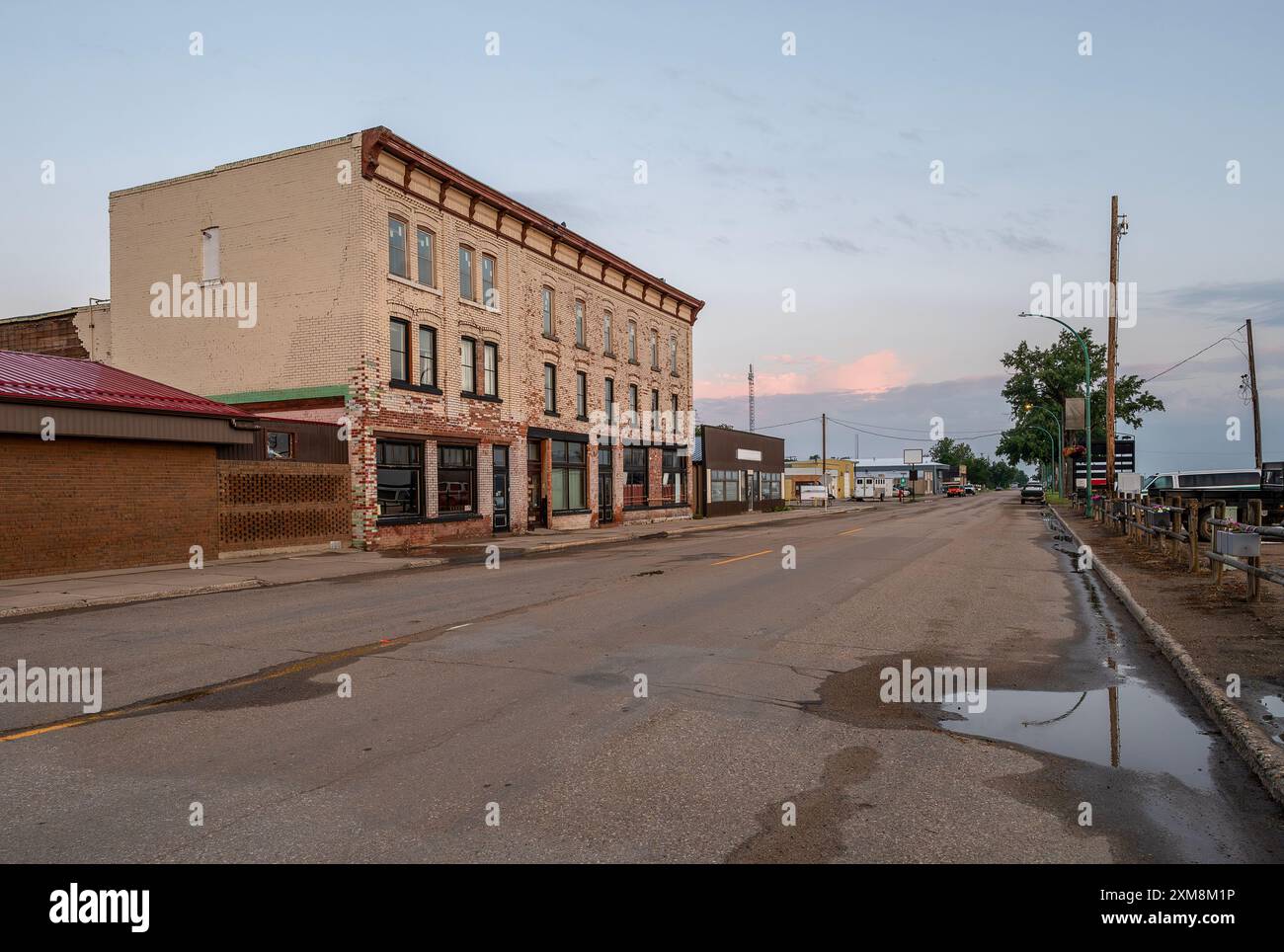 Wet street in the town of Maple Creek, Saskatchewan, Canada Stock Photo ...