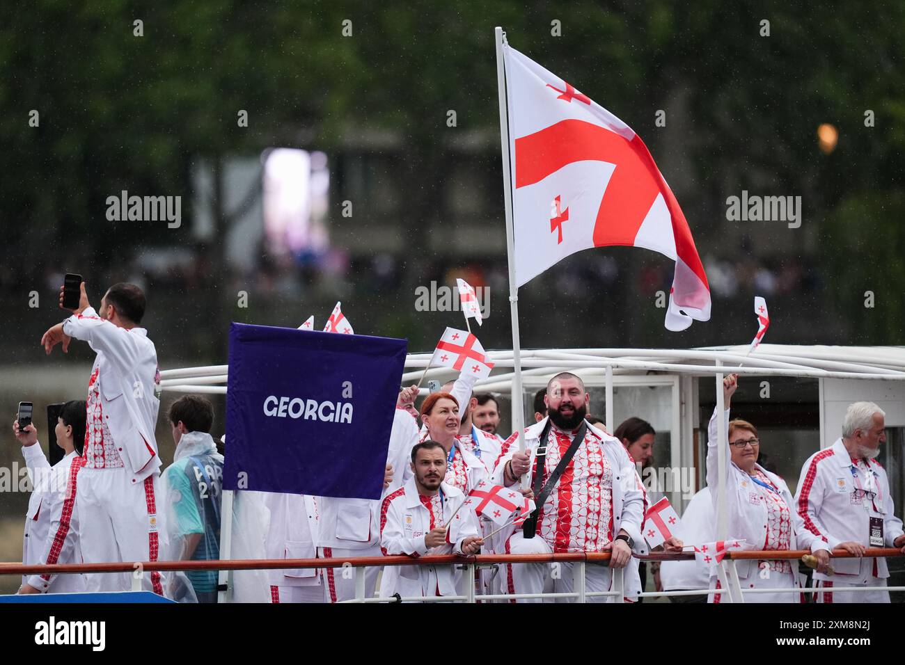 Georgia flagbearers Nino Salukvadze and Lasha Talakhadze and the ...