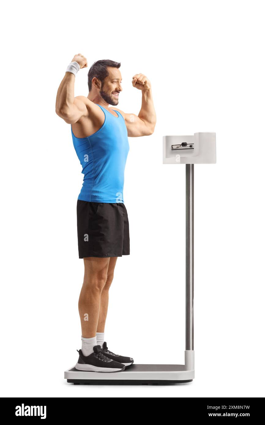 Fit man standing scale in hi-res stock photography and images - Alamy