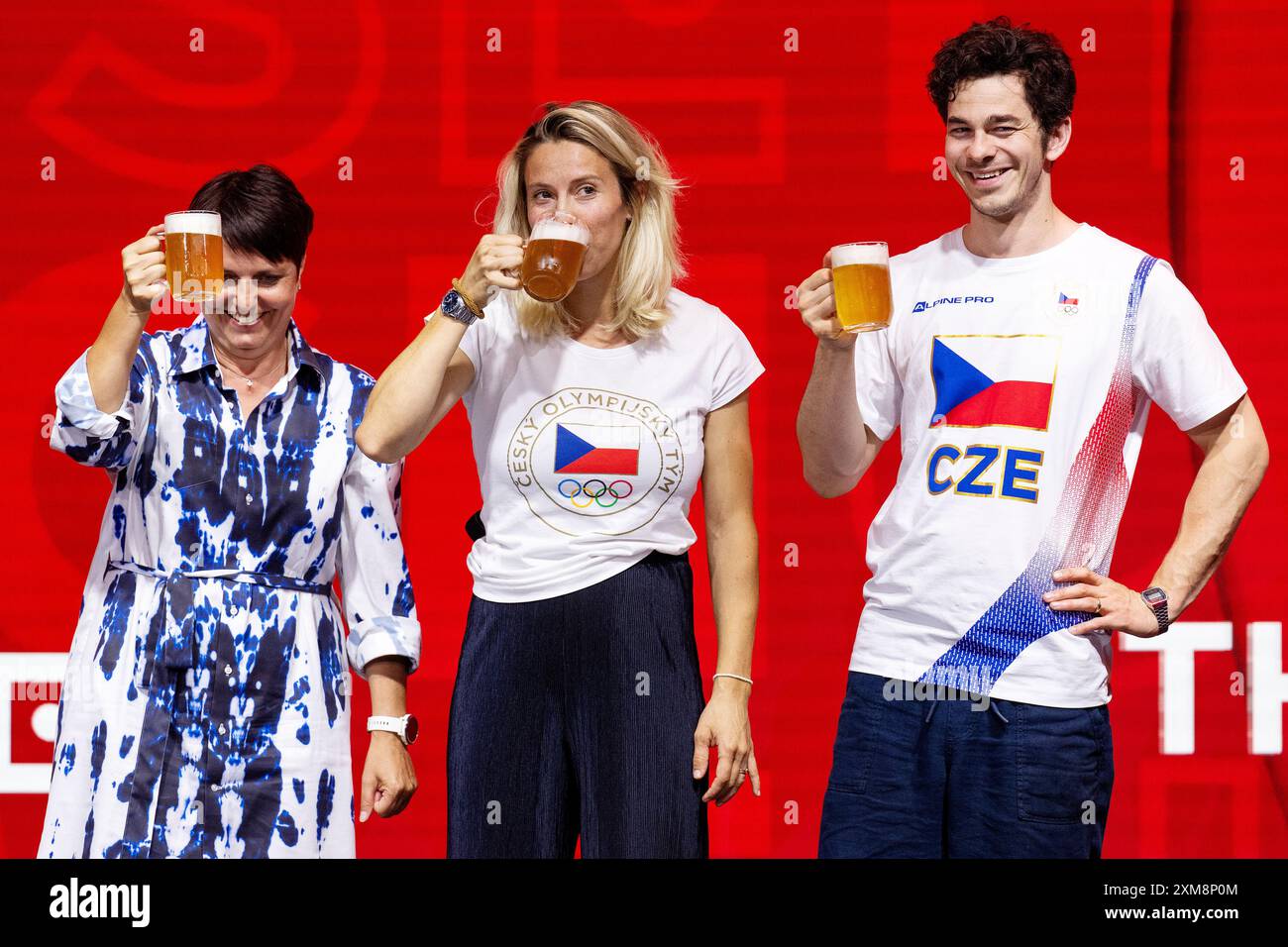 Paris, France. 26th July, 2024. Actor Marek Adamczyk (from right) and ...