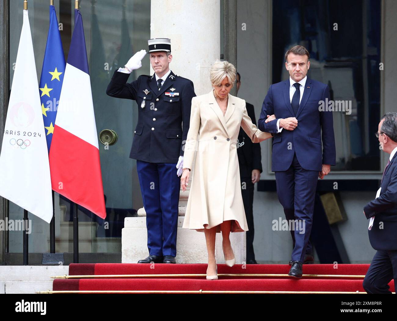 Brigitte Macron and French president Emmanuel Macron attending ...