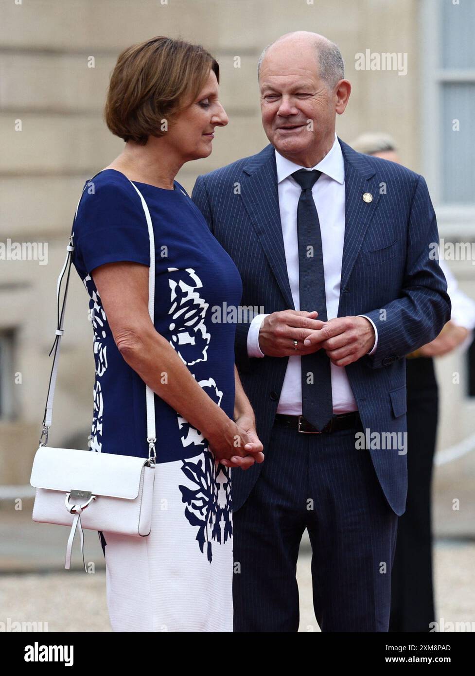 Olaf Scholz, Chancellor of Germany, and his wife Britta Ernst attending ...
