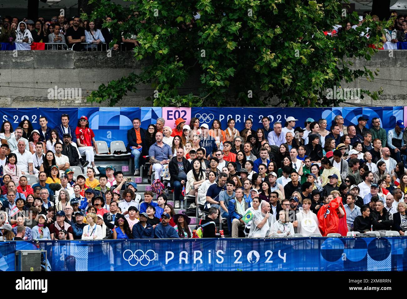 Paris, France. 26th July, 2024. People attend the opening ceremony of ...
