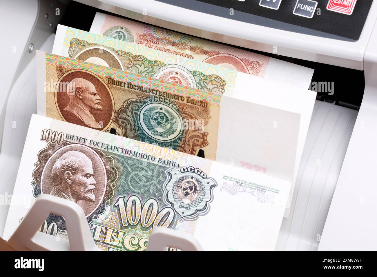 Russian money - ruble in the counting machine Stock Photo - Alamy