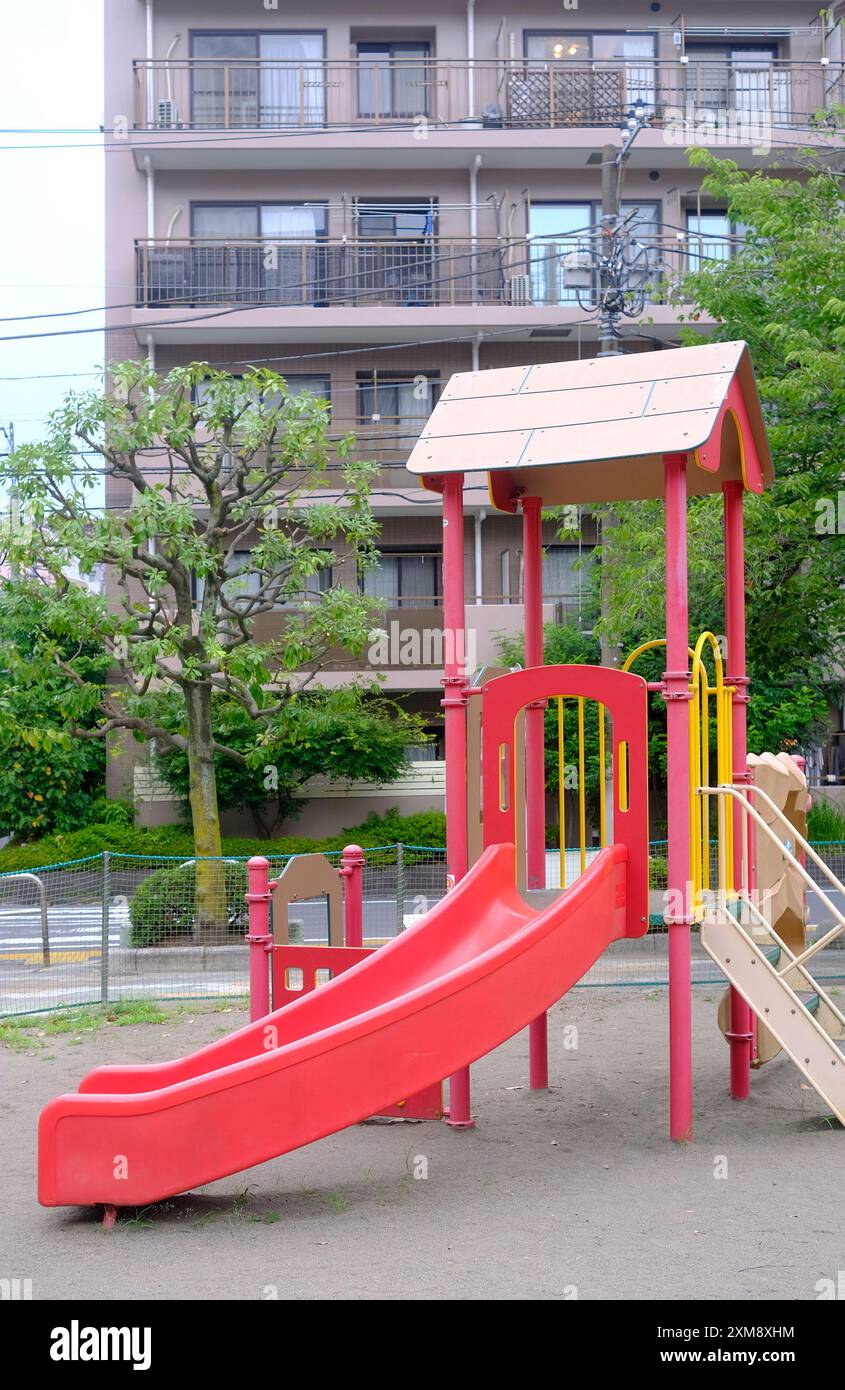 The red joyful slide for child and kids in Japanese residential ...
