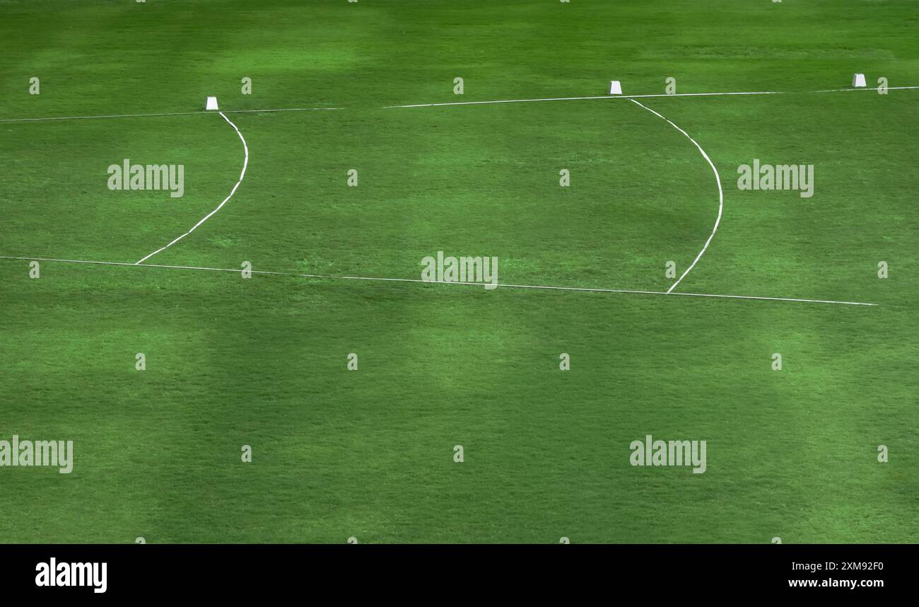 Javelin, discus, ball and hammer throw area in track and field stadium ...