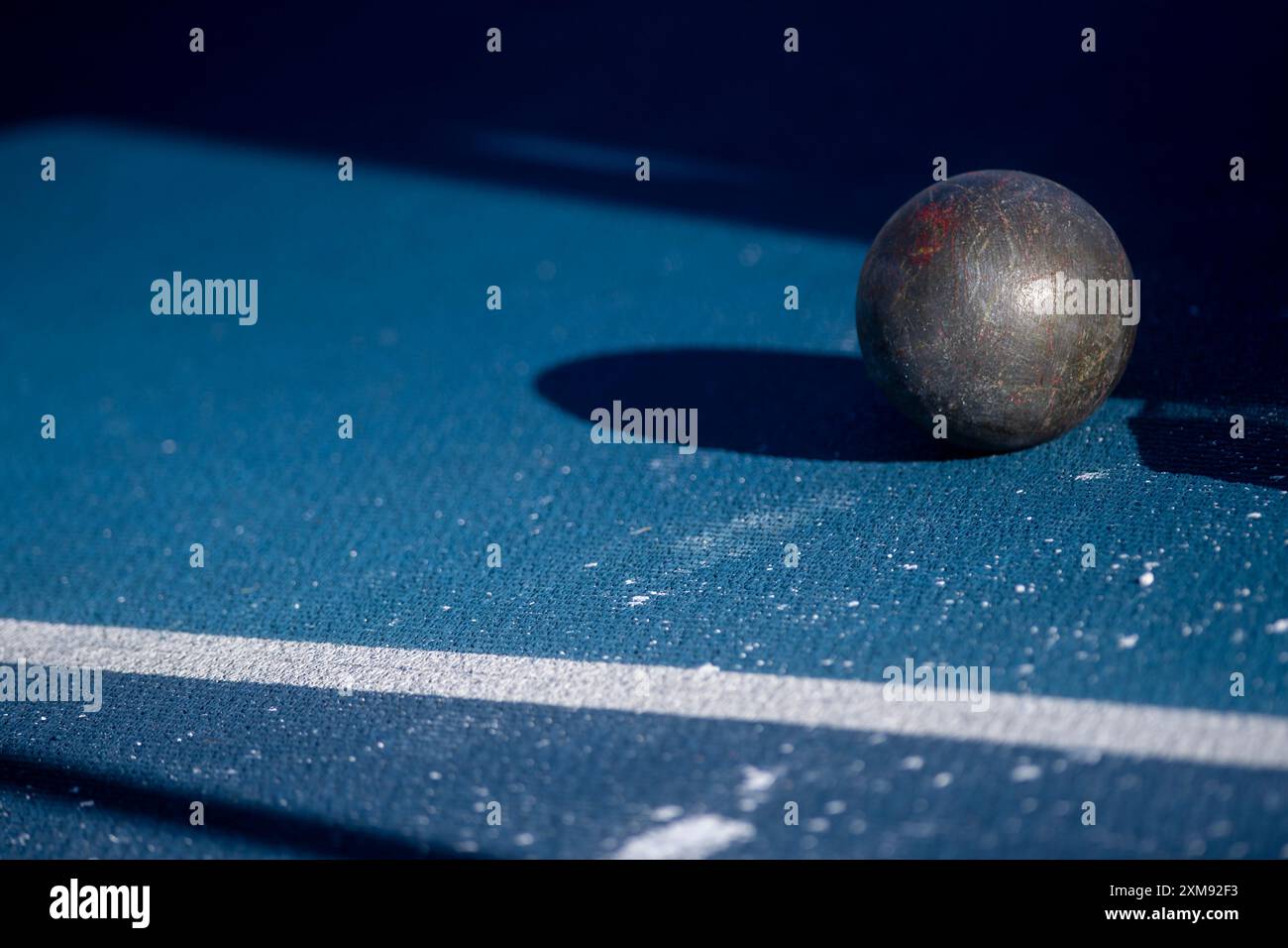Shot put prepared for competition. Track and field background ...