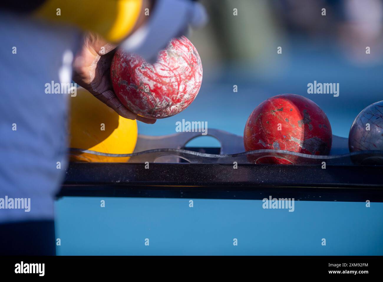 Shot put prepared for competition. Track and field background ...