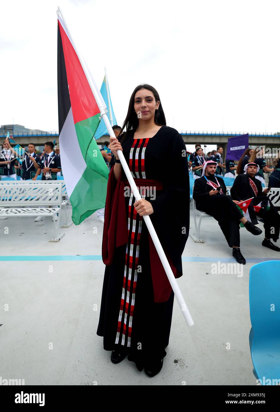Rama Abo-Alrub, flag bearer for Jordan, poses for a photo aboard the ...