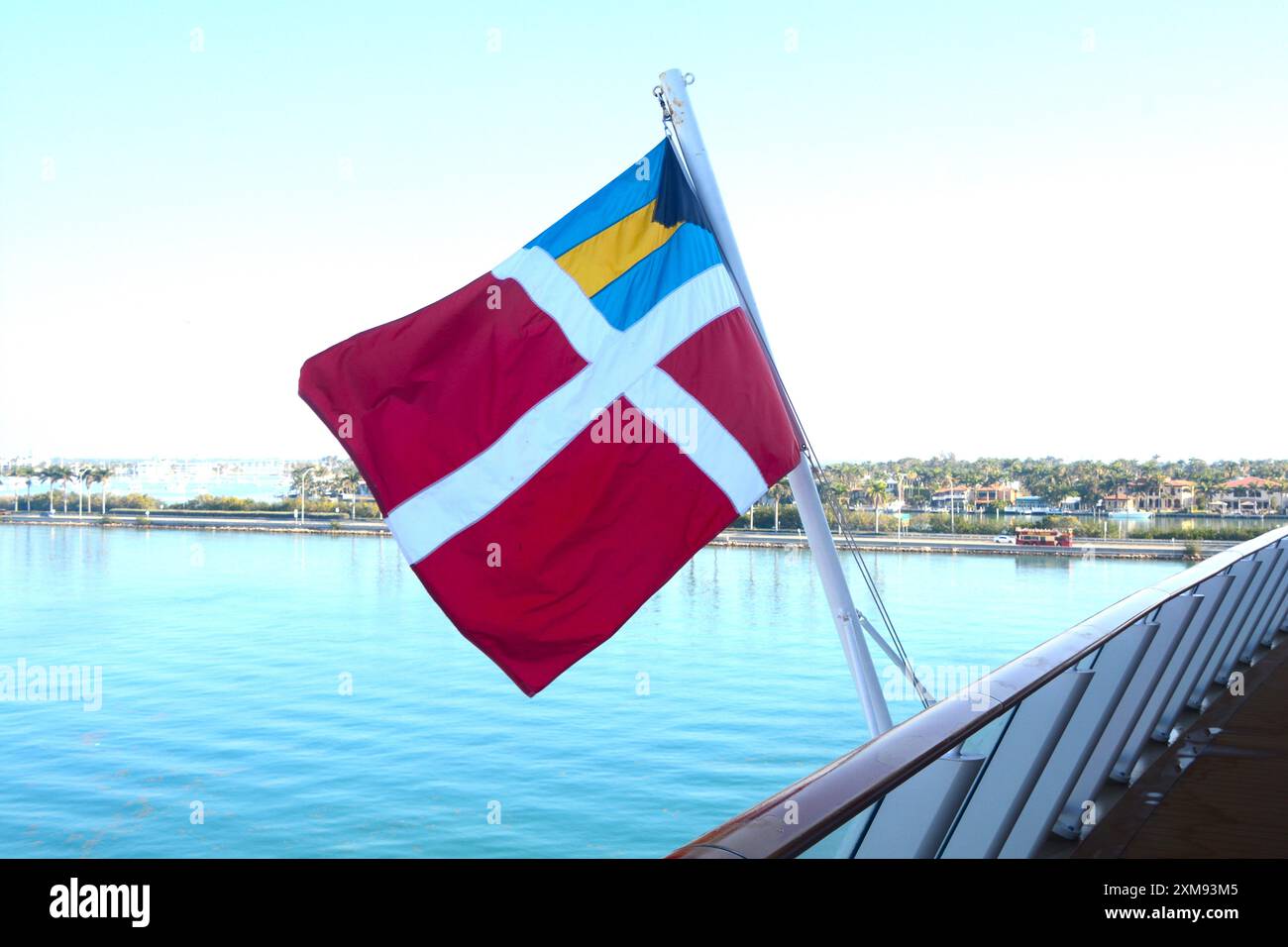 The Civil Ensign flag of the Bahamas flies behind a cruise ship in ...