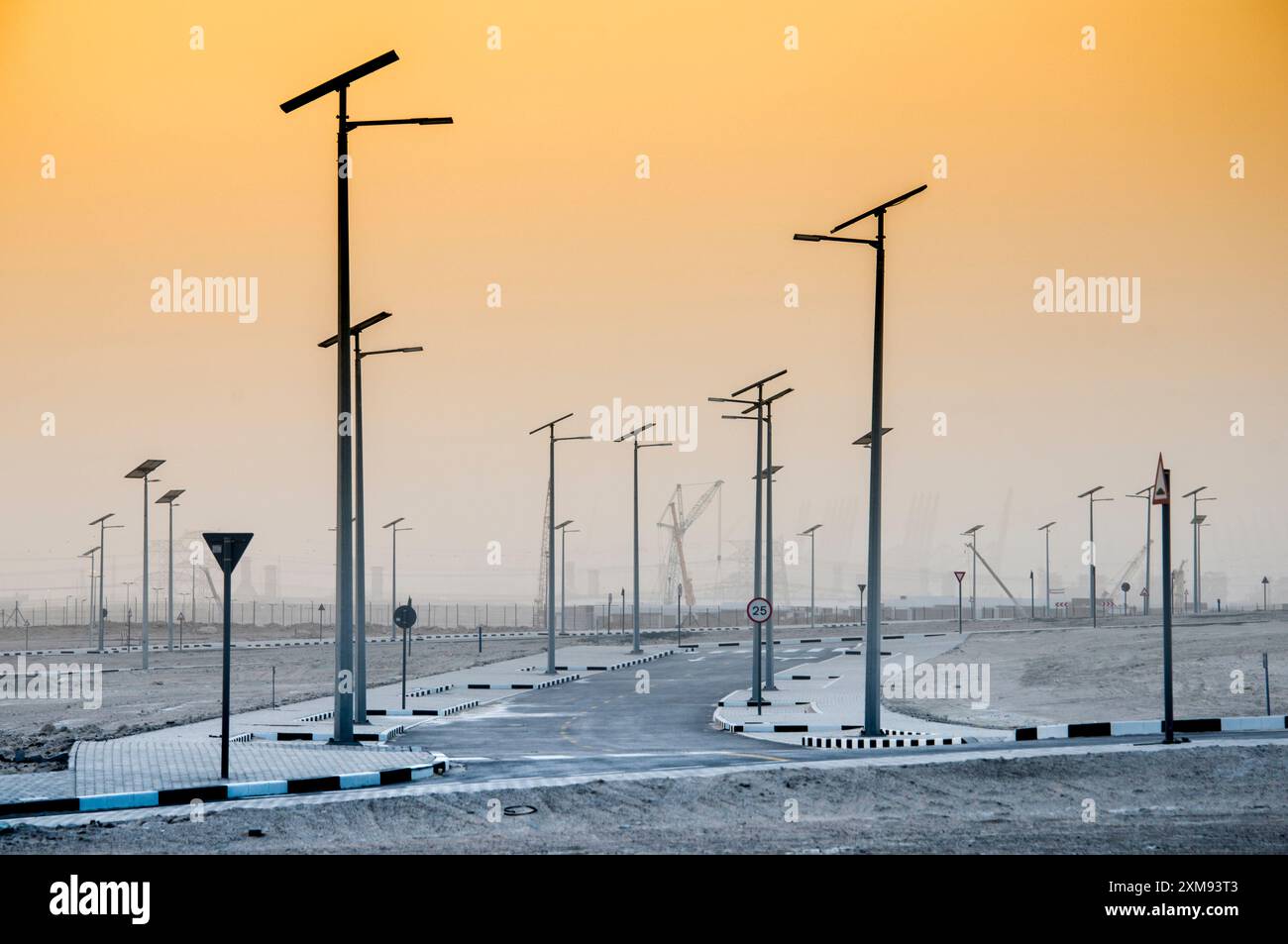 new infrastructure project street in the desert lined with solar ...