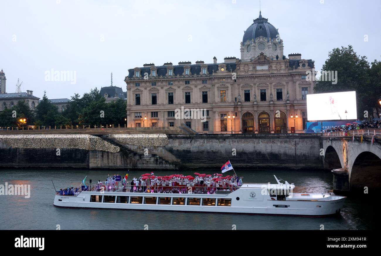 Paris, France. July 26th 2024. Team Serbia and Seychelles wave to spectators as they make their ...