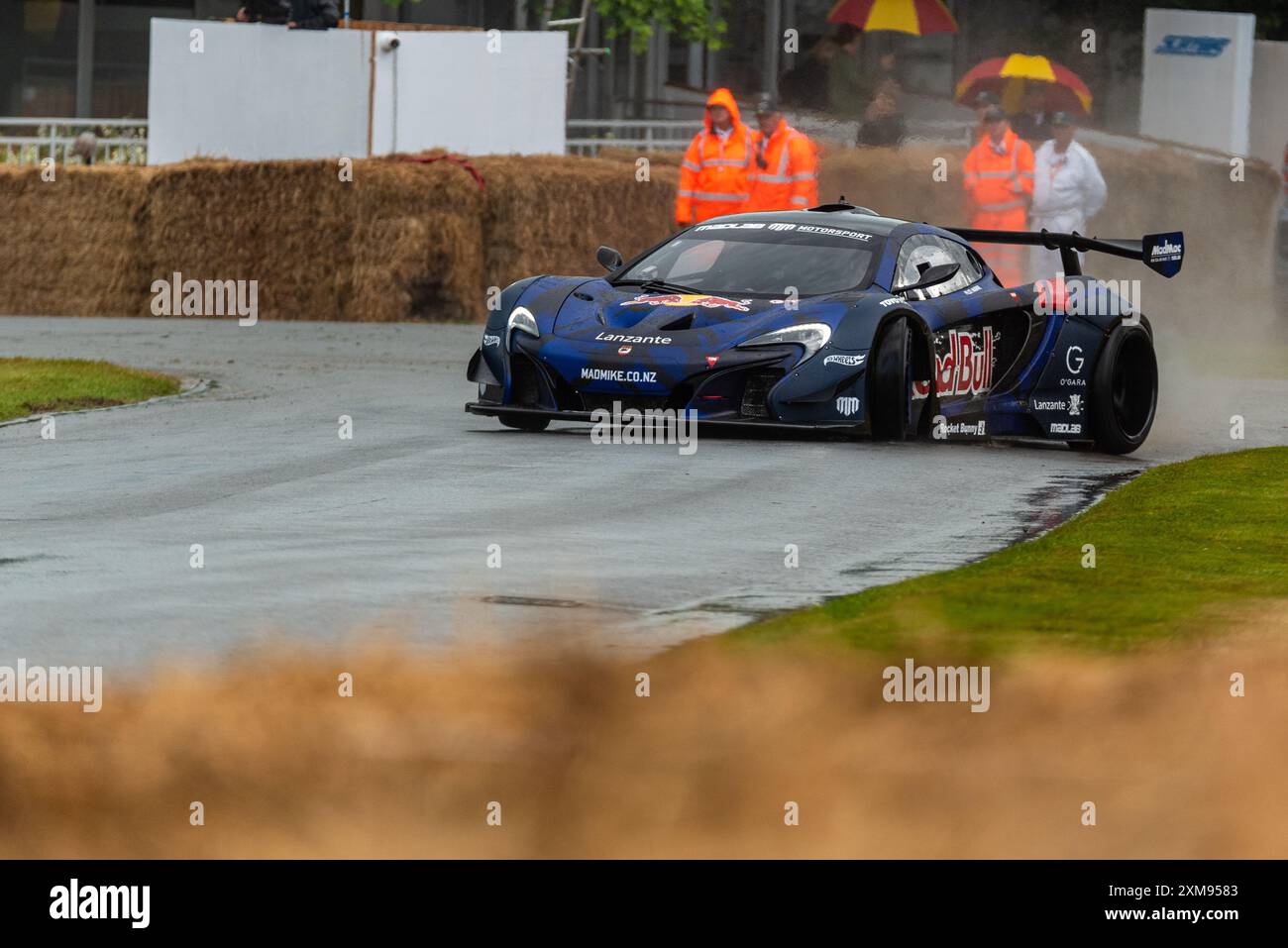 McLaren P1 GTR/650S GT3 'MADMAC' drift car driving up the wet hillclimb ...