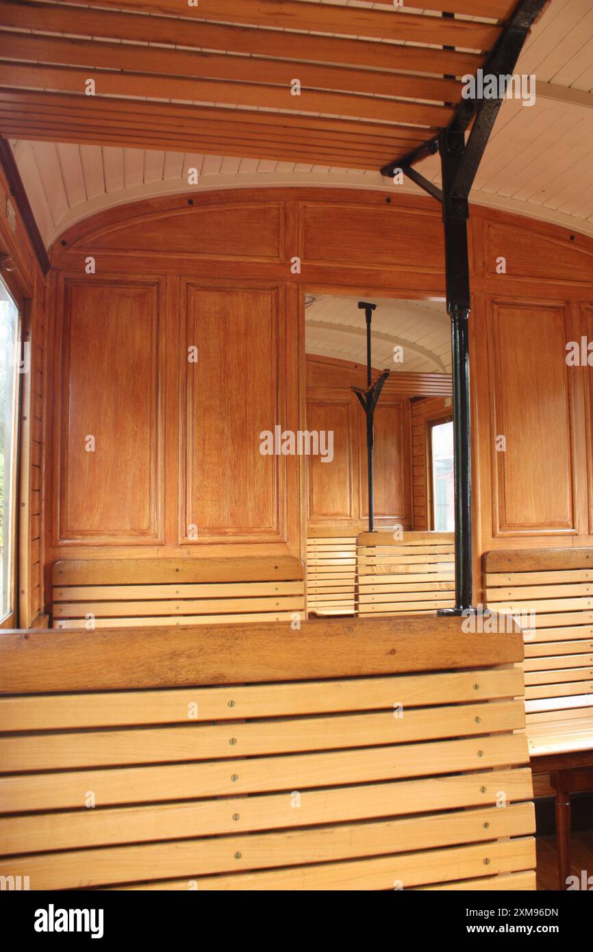 The pristine wooden interior of a carriage on the Welshpool and ...
