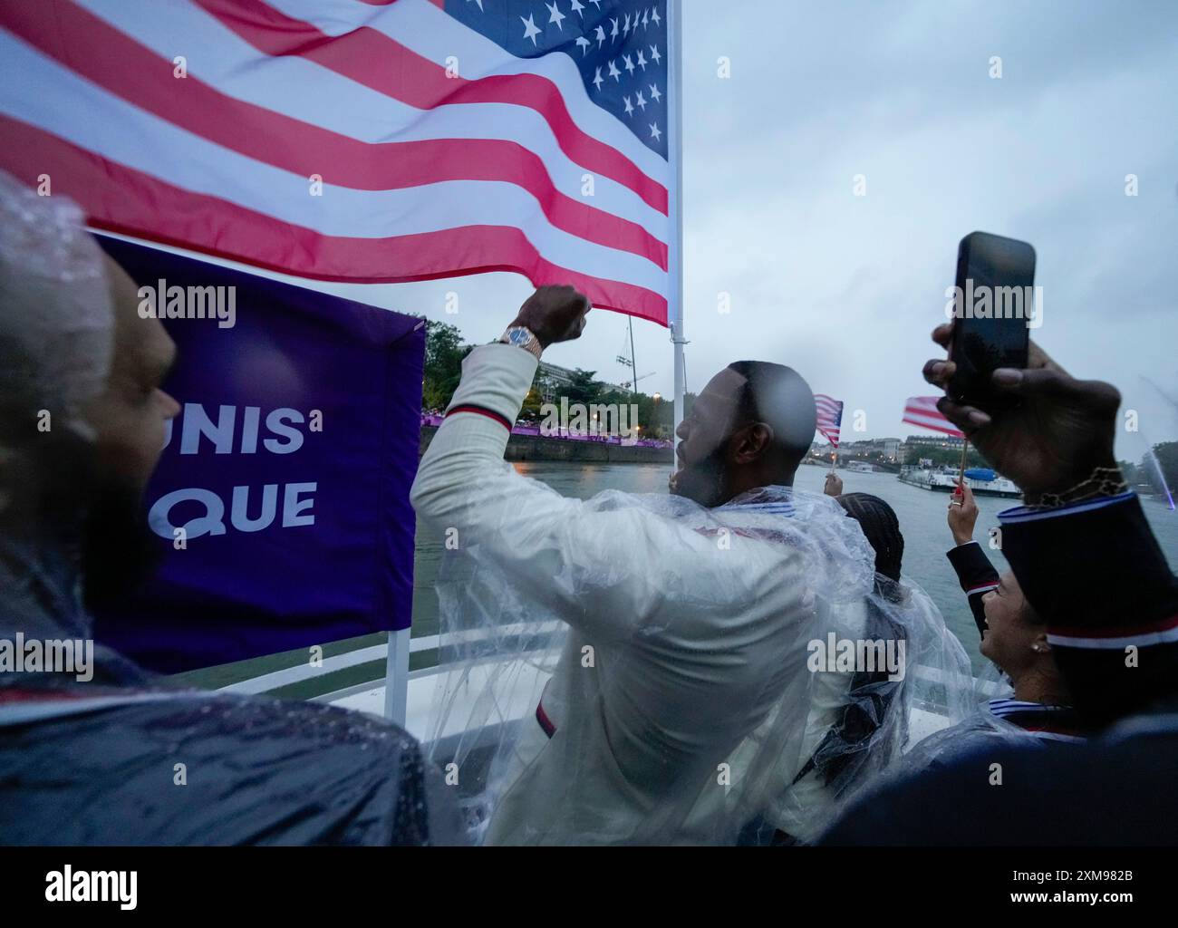 United States' Lebron James gestures as he travels along the Seine ...