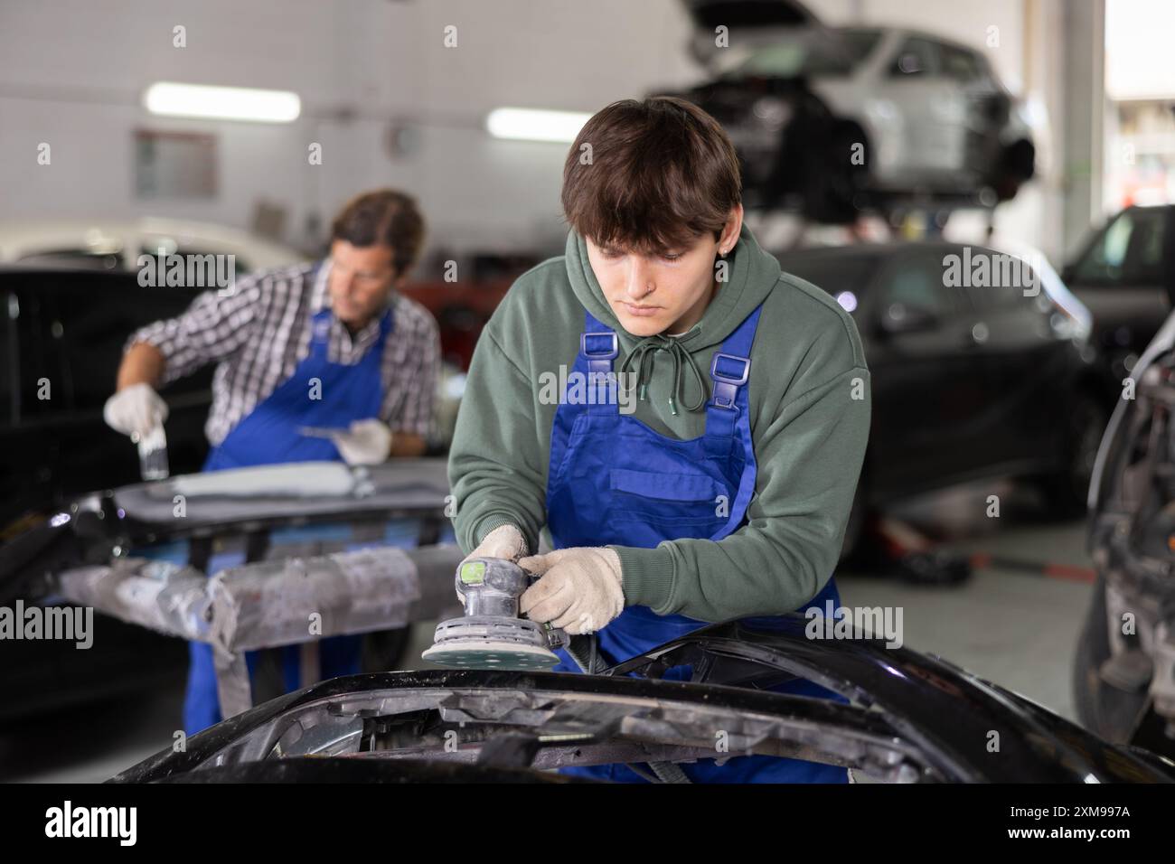 Auto mechanic sanding part hi-res stock photography and images - Alamy